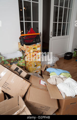 Berlin, Germany, stacked moving boxes in an empty room Stock Photo - Alamy