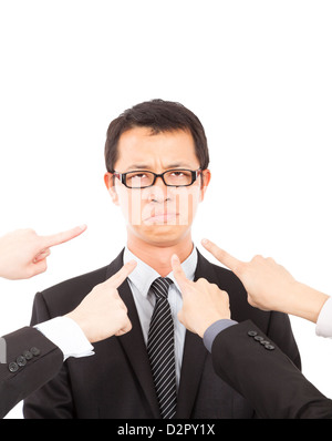 People pointing at embarrassed man on white background Stock Photo - Alamy