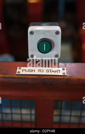 Push to start button on an old industrial machine Stock Photo - Alamy
