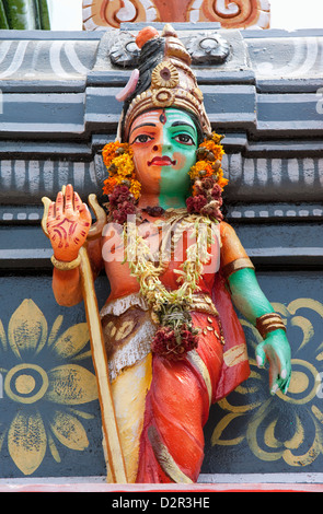 India, Kerala, Munnar, religion , colourful small Hindu temple next to ...