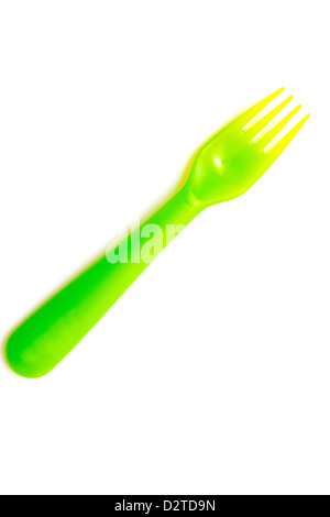 green plastick fork on white background Stock Photo - Alamy