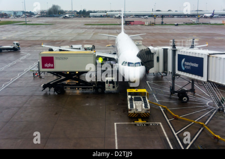 Manchester Airport and Flight to Lanzarote A321 loading up Stock Photo ...