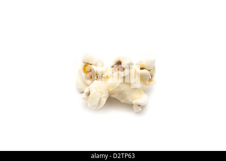 Single popped popcorn on a white background with clipping path and ...