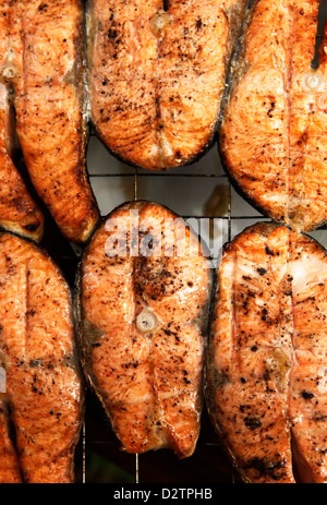 Fried sea fish. Preparation on open fire Stock Photo - Alamy