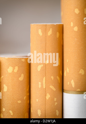 Tobacco in cigarettes with a brown filter close up Stock Photo - Alamy