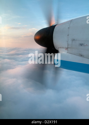 Propeller Jet engine with sunrise taken from inside aircraft Stock ...