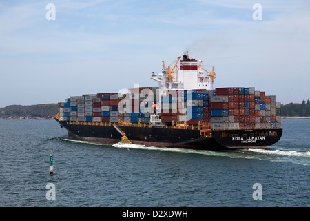 Port Botany pilot vessel alongside departing container ship as its ...