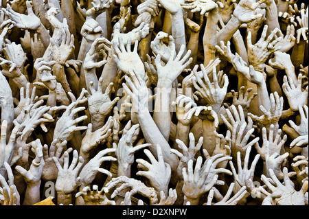 Hands from Hell in the White Temple, Chiang Rai, Thailand Stock Photo ...