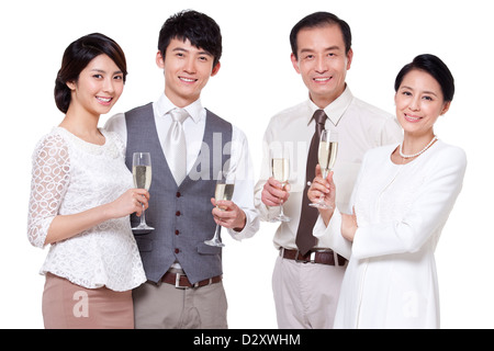 Wealthy family having champagne Stock Photo - Alamy