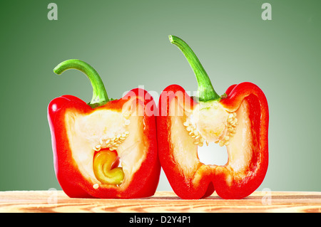 Two slices of red paprika on white background Stock Photo - Alamy