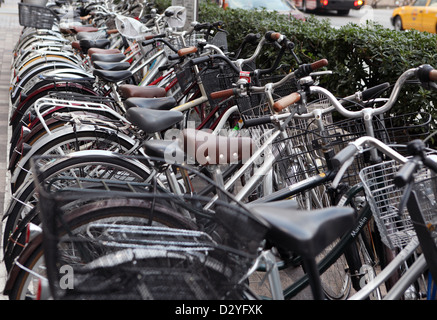 Bicycles in Tokyo, Japan. Tokyo has many bicycles since the land is ...