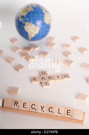 Reduce, Recycle, Reuse, words in wooden alphabet letters in crossword ...