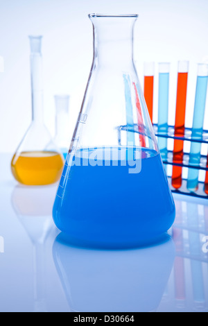 Laboratory flasks containing liquid color Stock Photo - Alamy