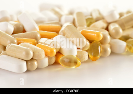 Composition with dietary supplement capsules and drug pills Stock Photo ...