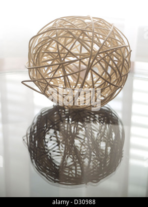 round woven plastic ball on table Stock Photo - Alamy