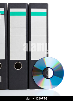 Ring binder with compact disc over white background - digital storage ...