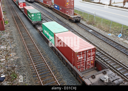 Shipping containers on the railway. Evergreen and APL containers Stock ...