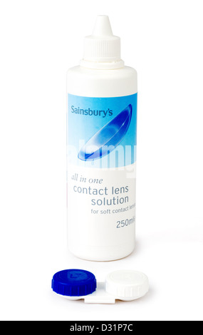 Storage container for soft contact lenses and solution bottle on table ...