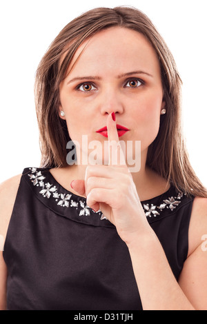 Keep quiet sign. Portrait of a beautiful woman in casual clothing ...