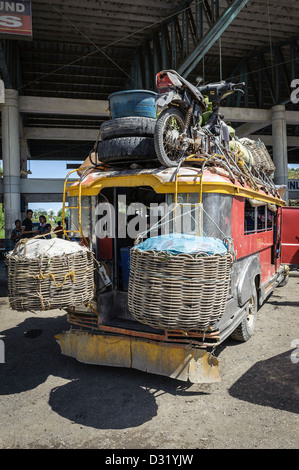 Overloaded jeepney waiting for passengers at Puerto Princesa bus ...