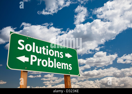 Solutions Green Road Sign With Dramatic Clouds and Sky Stock Photo - Alamy
