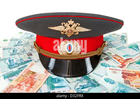 Russian police officer cap on the batch of banknotes Stock Photo - Alamy