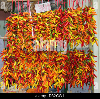 Green, Red and Orange Peppers for Sale Stock Photo - Alamy