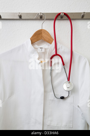 photo of hanging lab coat Stock Photo - Alamy
