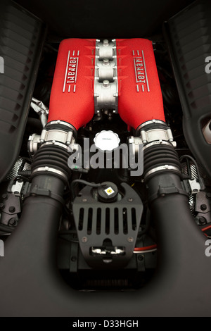 Ferrari 458 Italia car engine bay with red intake manifold. Detail ...