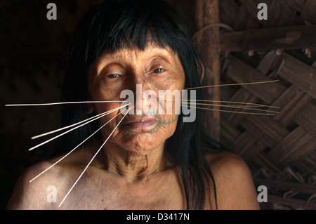 A Matses Mayorunas elderly woman with traditional whiskers and tattoos ...