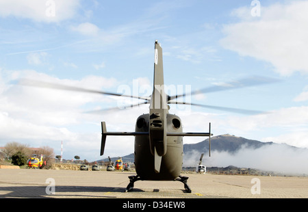 View of a military helicopter on the flight deck of a naval ship ...