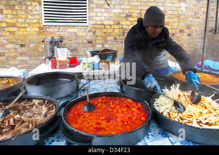 Curry food stall in Brick Lane in London, UK Stock Photo - Alamy