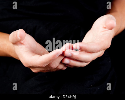 White man's hands open to receive double hand-fulls Stock Photo - Alamy