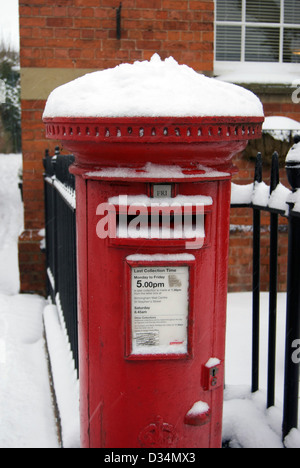 royal mail postbox covered in heavy snowfall Stock Photo - Alamy