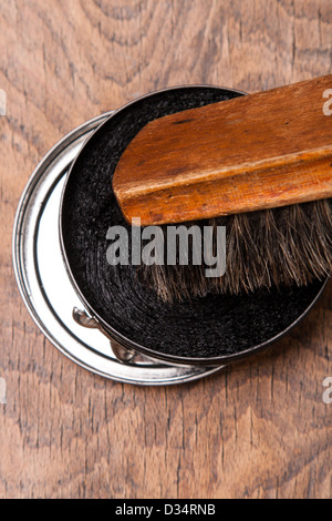Container of Shoe Polish and Brush on White Background Stock Photo - Alamy