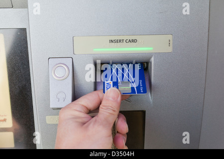hand inserting card into ATM Stock Photo - Alamy
