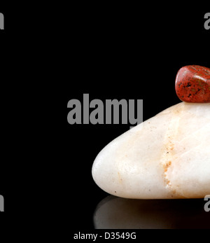 Concept made by many rocks isolated on black Stock Photo - Alamy