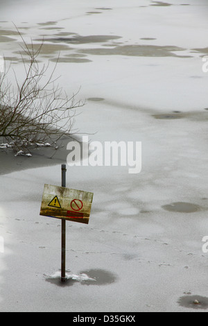 A Danger, Beware Deep Cold Water warning sign on a beach in Kent Stock ...