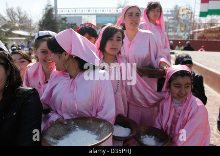Girls in ethnic dresses at a Navruz celebration near Dushanbe ...