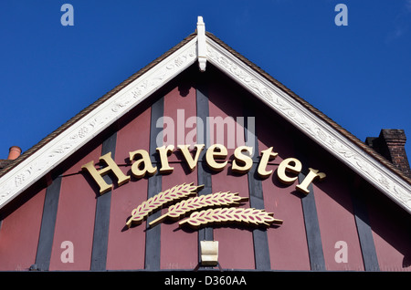 Harvester restaurant sign logo Stock Photo - Alamy