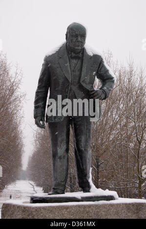 Overnight snow covers the 1959 statue by David McFall RA (1911-1988) of ...