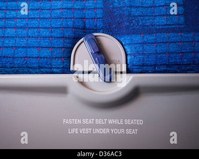 Airplane / plane seat tray table in the full down position and ready ...