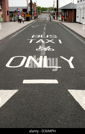 Road markings for bus, taxi and bicycle lanes. Gran Via, Central Madrid ...