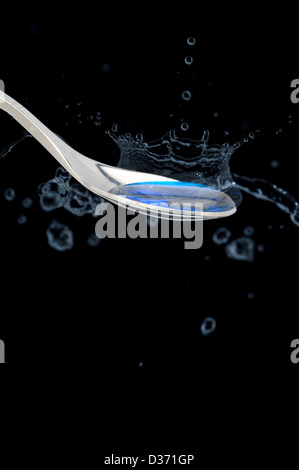 A closeup shot of a shiny teaspoon in a warm cup of coffee Stock Photo ...
