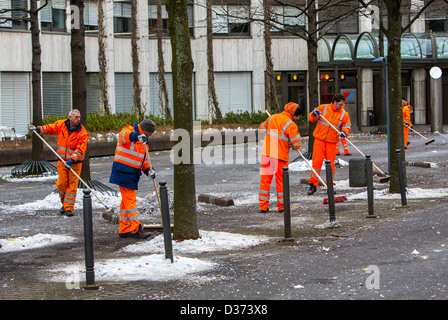 Municipal cleaning services, after a carnival parade, cleaning the ...