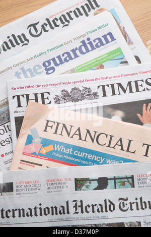 Selection of broadsheet quality newspapers from the United Kingdom laid ...