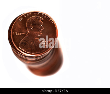 Stack of pennies isolated on white background Stock Photo - Alamy
