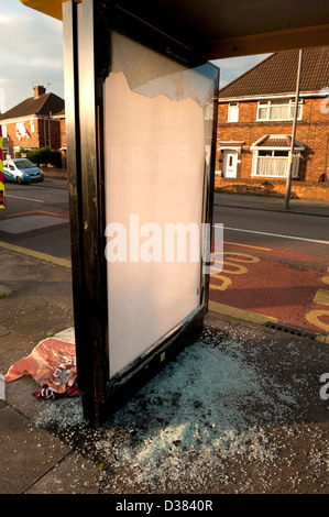 smashed glass at a bus stop Stock Photo - Alamy