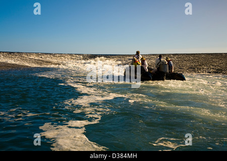 Zodiacs probe the Montgomery Reef, the world's largest inshore reef ...