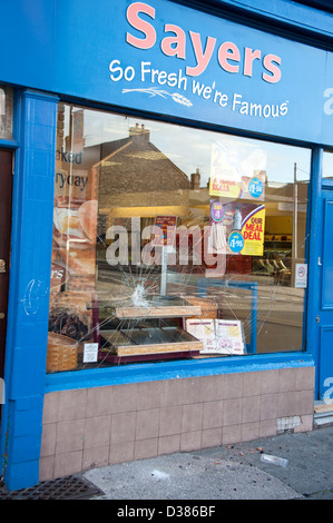 A smashed shop window Stock Photo - Alamy